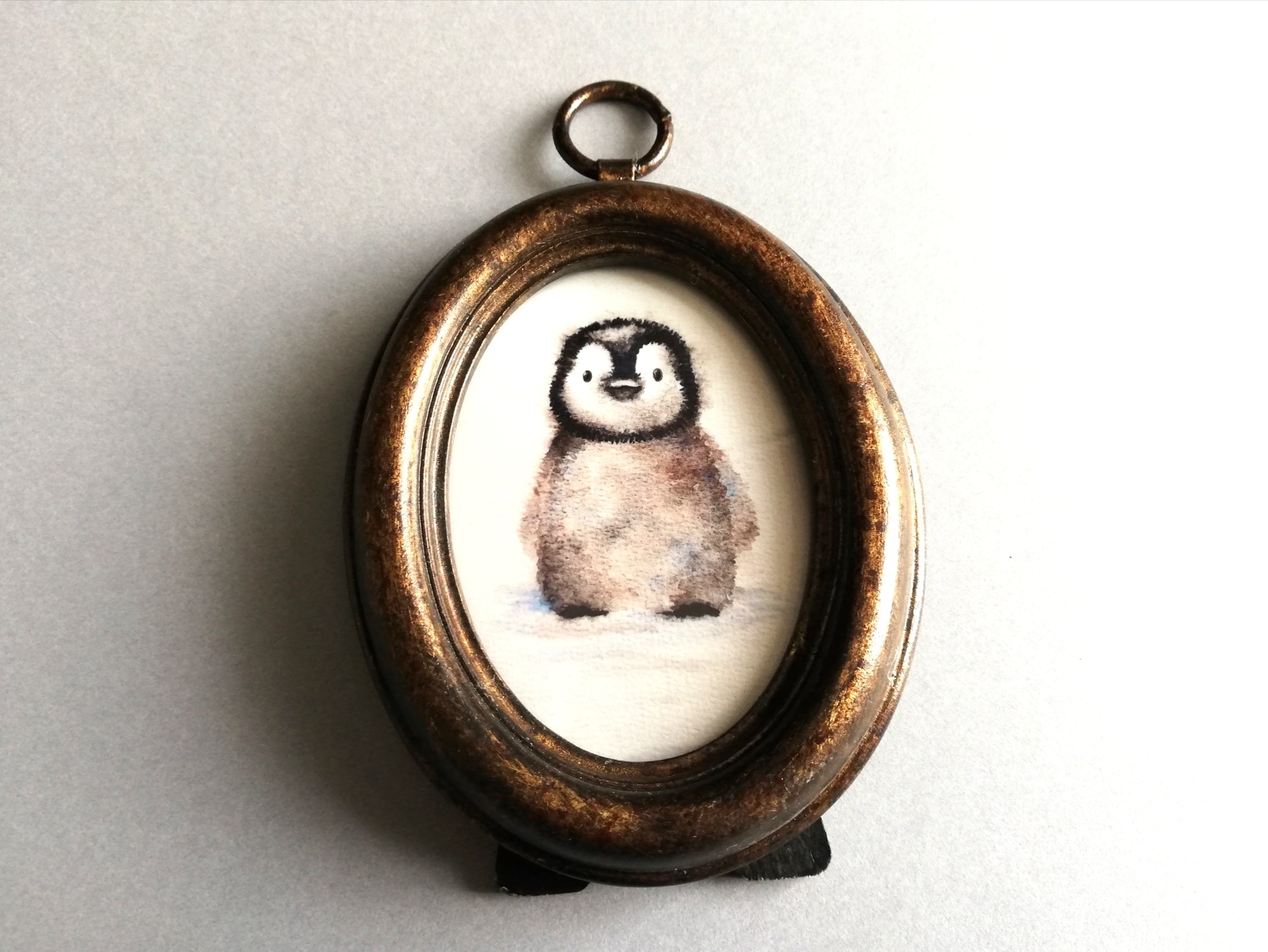 Framed penguin print – by Kate Elford